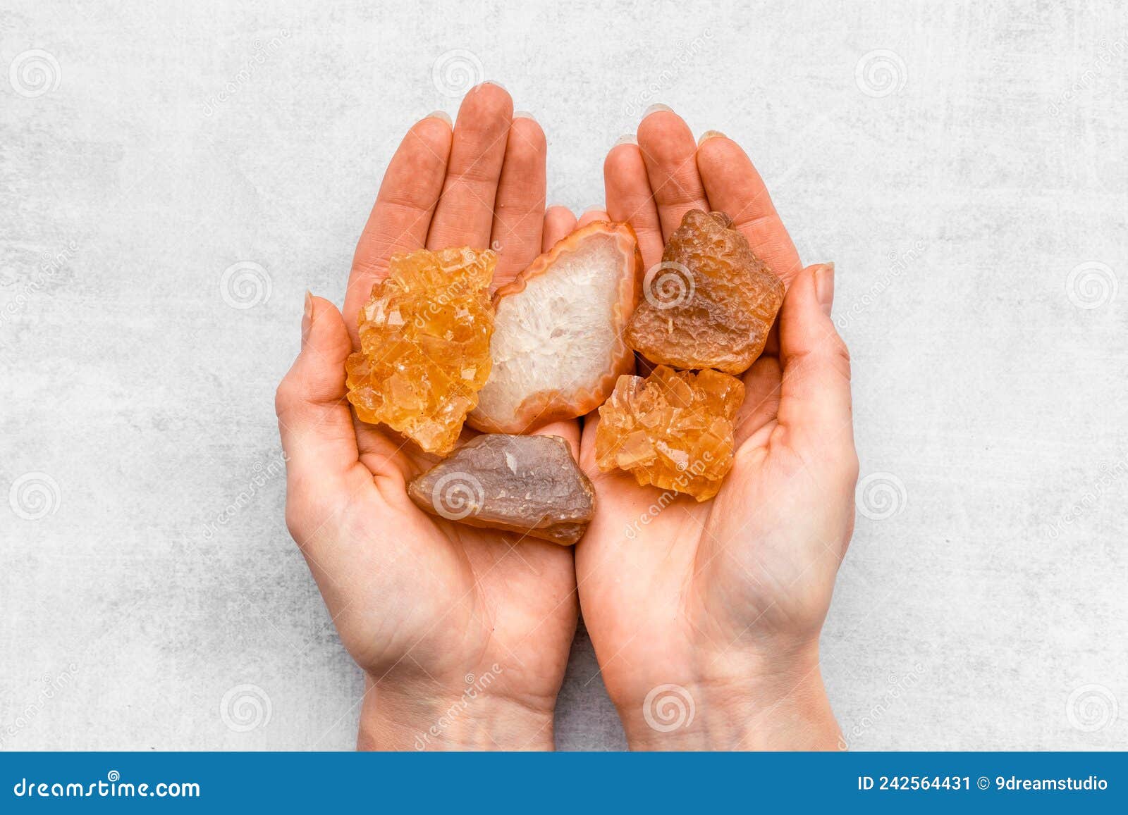 Hands Holding Natural Mineral Rock or Shiny Gemstone Stock Image ...