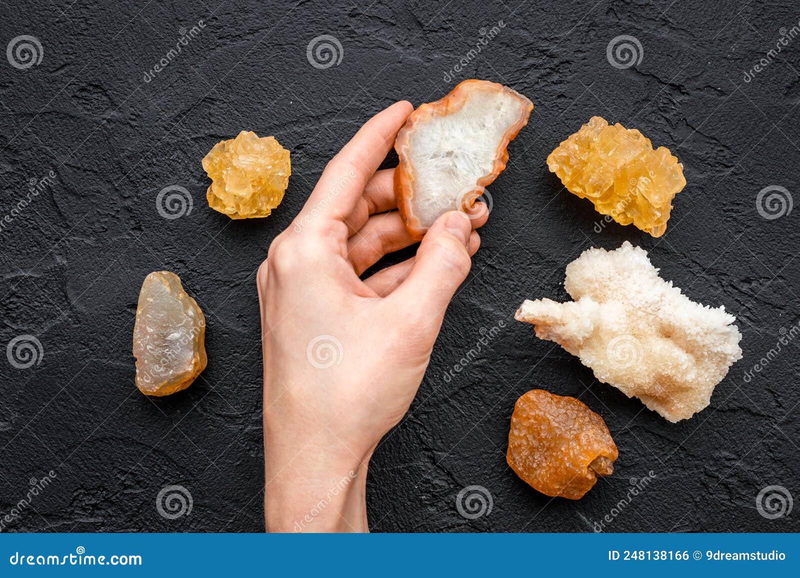 Hands Holding Natural Mineral Rock or Shiny Gemstone Stock Photo ...