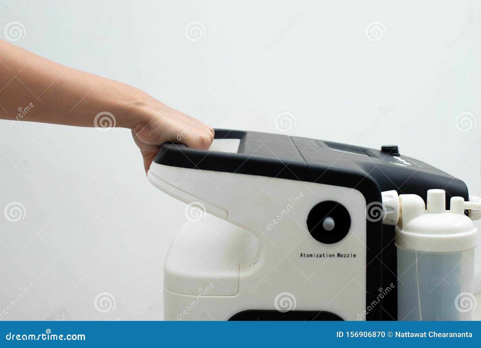 Hands Holding Oxygen Concentrator Device Stock Photo - Image of holding ...
