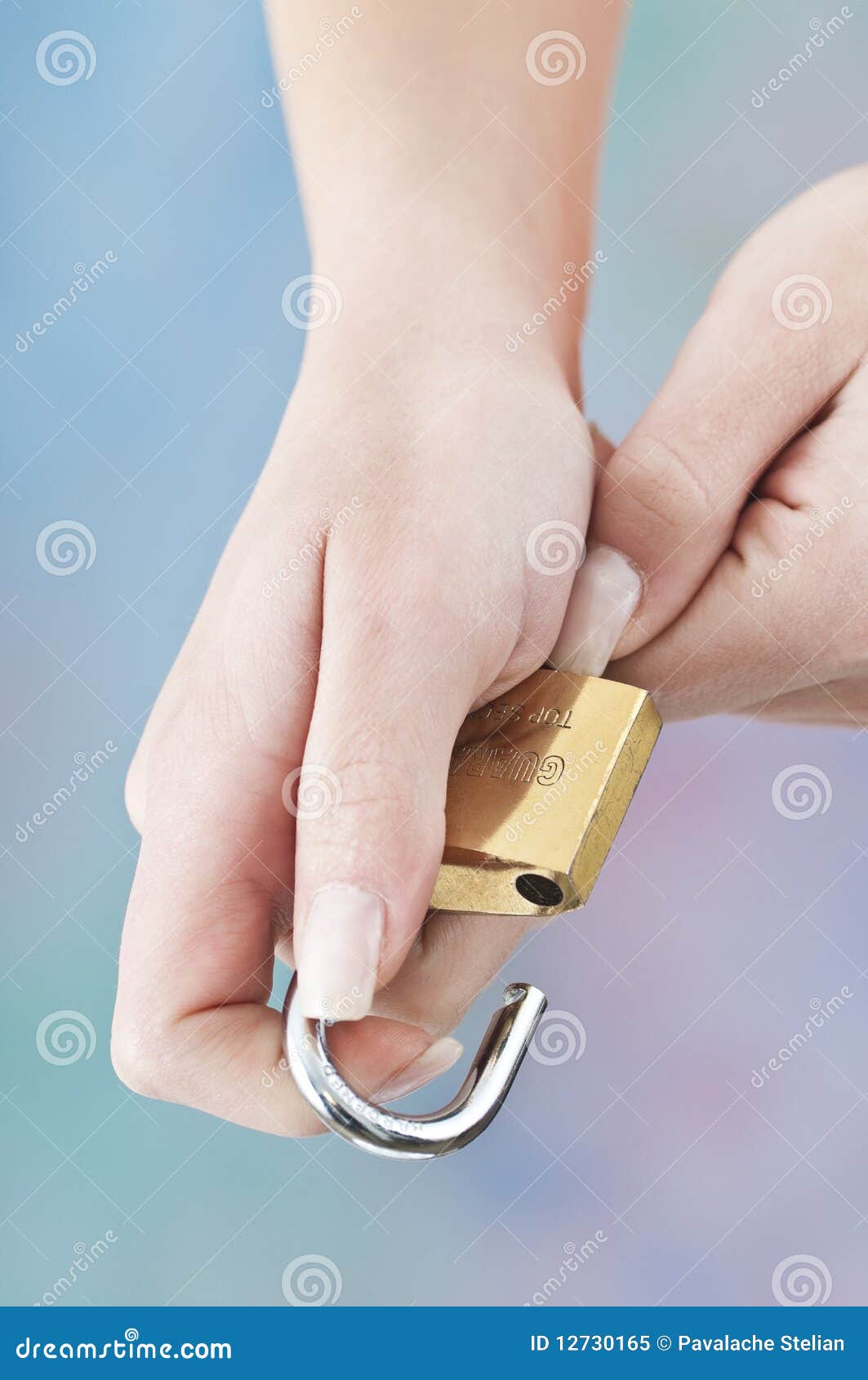 Hands holding padlock stock image. Image of closeup, holding - 12730165