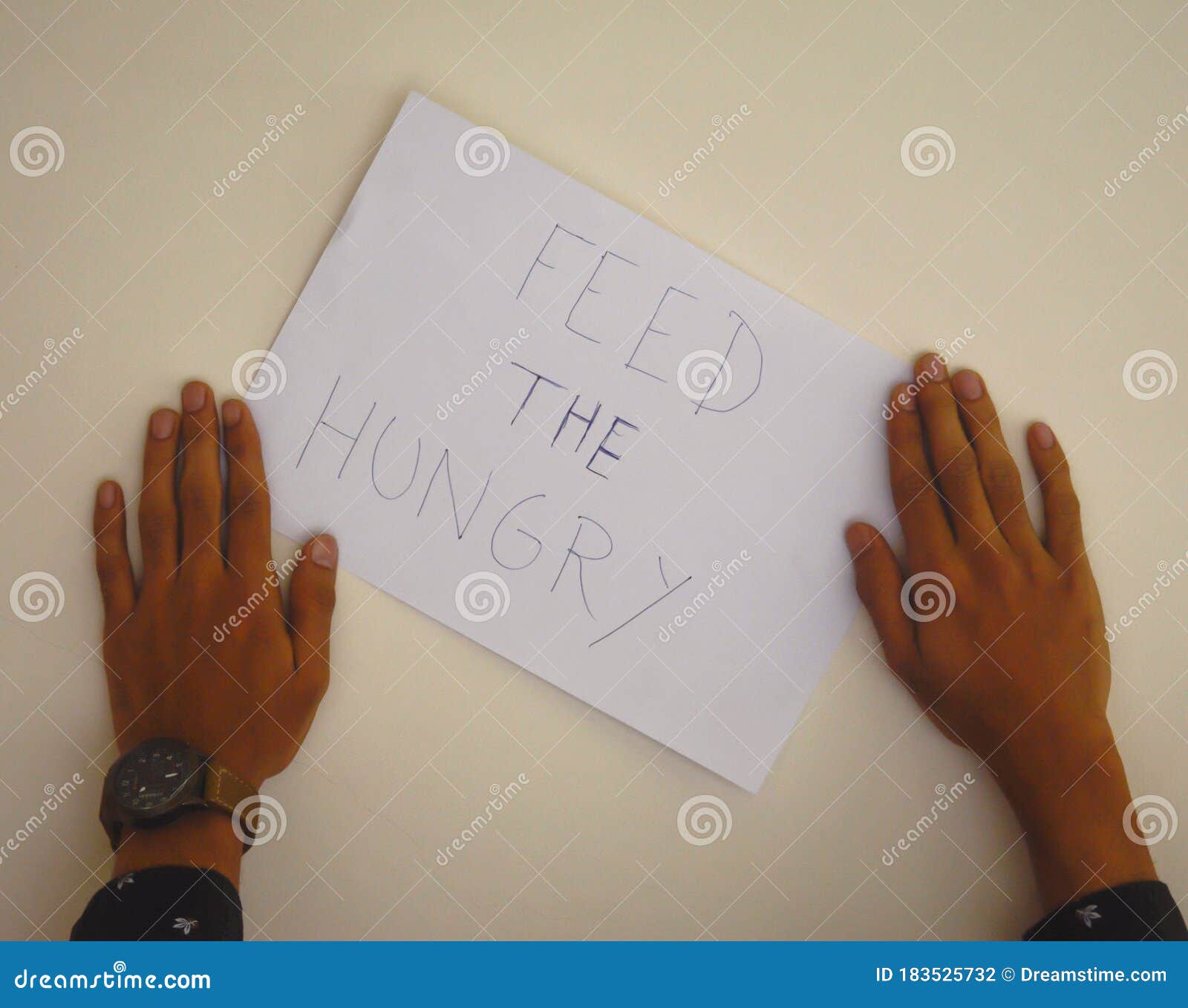 Hands Holding a Paper, Feed the Hungry Concept Stock Photo - Image of ...