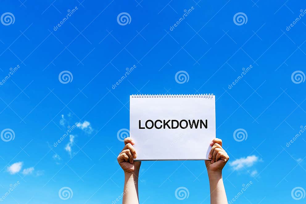 Hands Holding Paper Note with Lock Down Text Stock Image - Image of ...