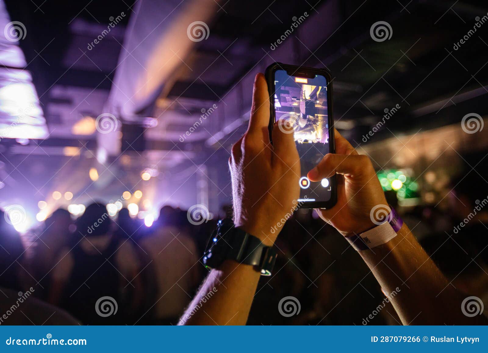 Hands Holding Phone and Making Photos on the Concert Stock Photo ...