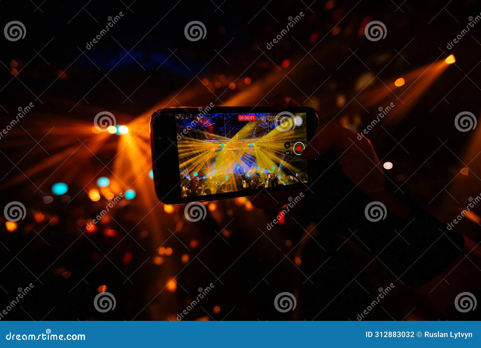 Hands Holding Phone and Making Photos on the Concert Stock Photo ...