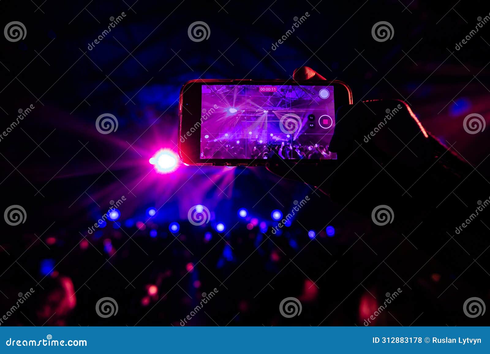 Hands Holding Phone and Making Photos on the Concert Stock Photo ...