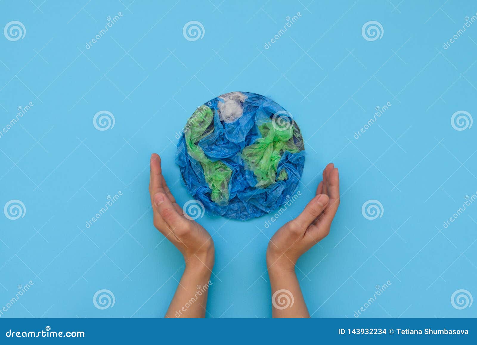 Hands Holding Planet Earth Made from Plastic Disposable Packages on ...