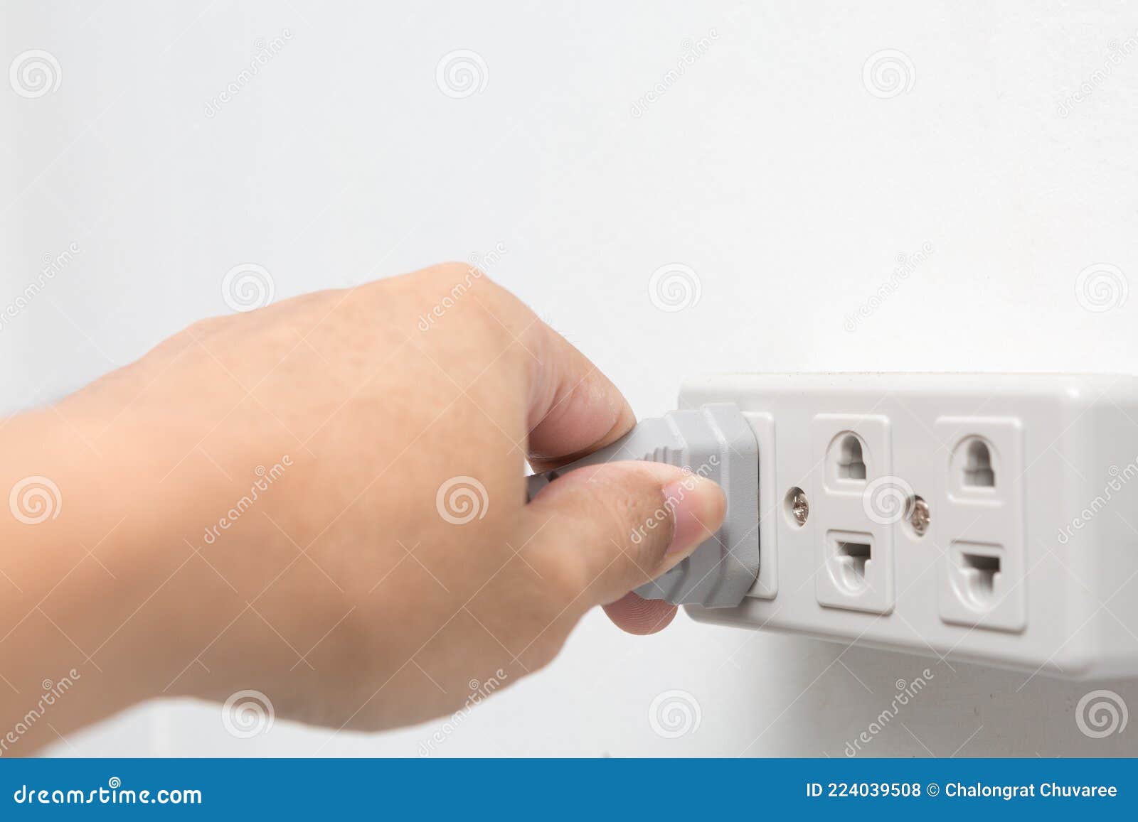Hands Holding Plugged in Power Socket on White Background Stock Photo ...