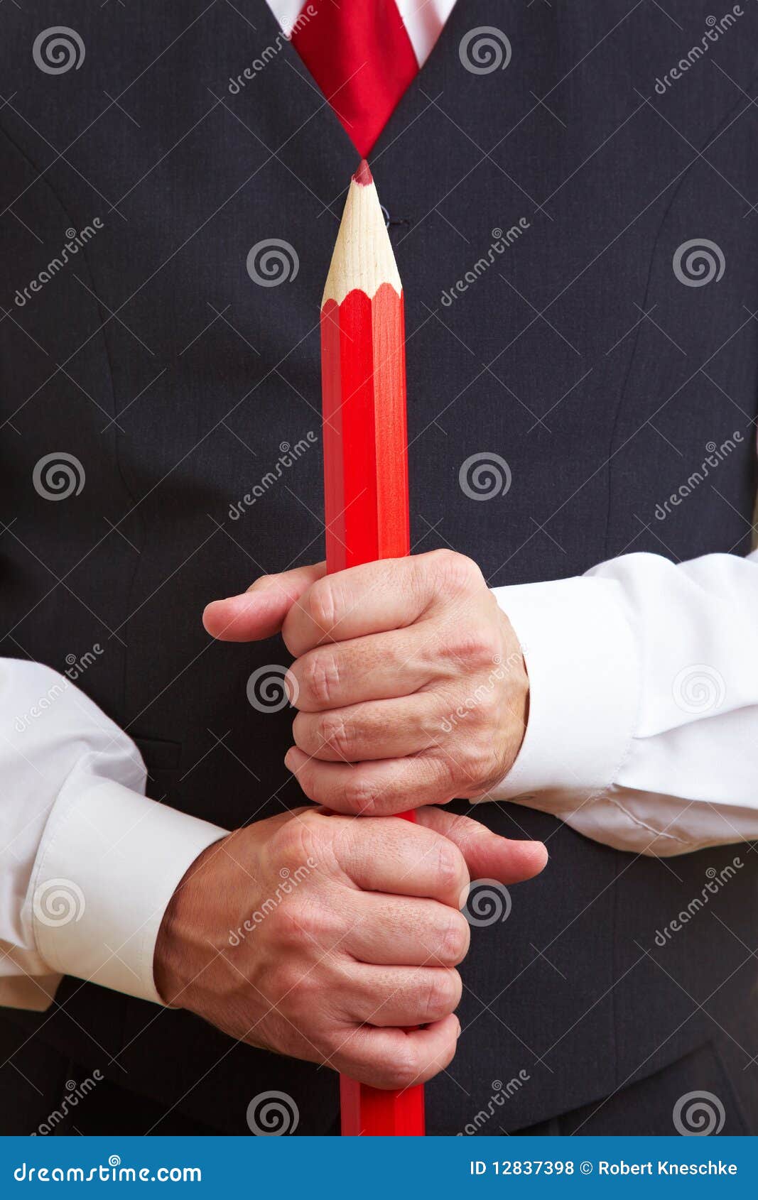Hands holding red pencil stock photo. Image of examiner - 12837398
