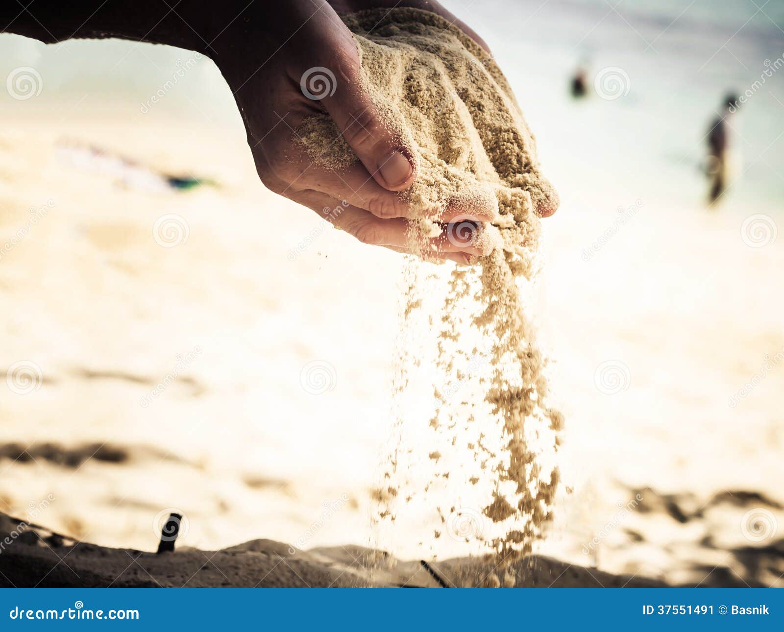 Hands holding sand stock image. Image of hand, running - 37551491