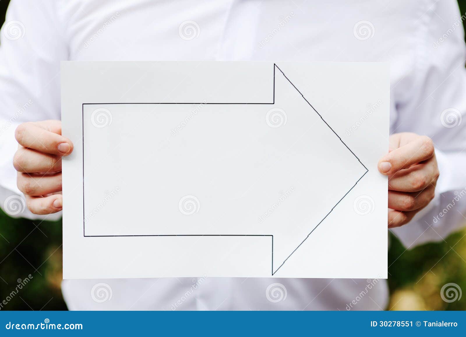 Hands Holding a Sign Indicating Right Direction Stock Image - Image of ...