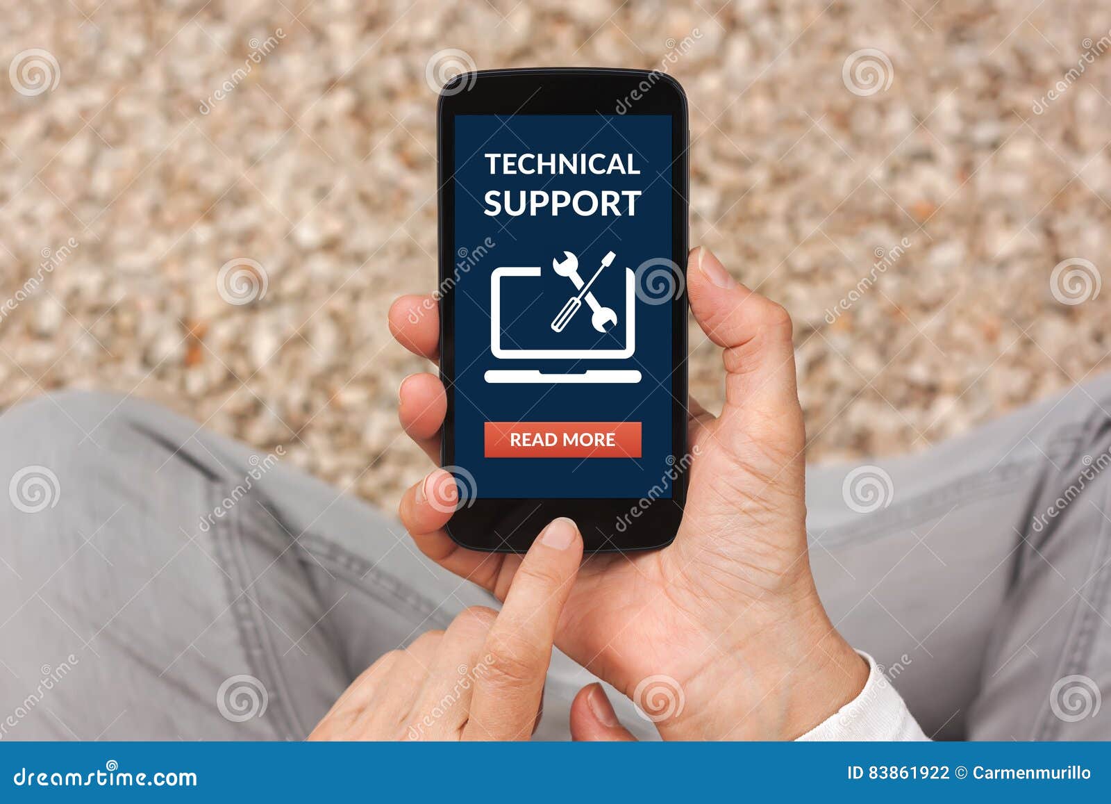 Hands Holding Smart Phone with Technical Support Concept on Screen ...