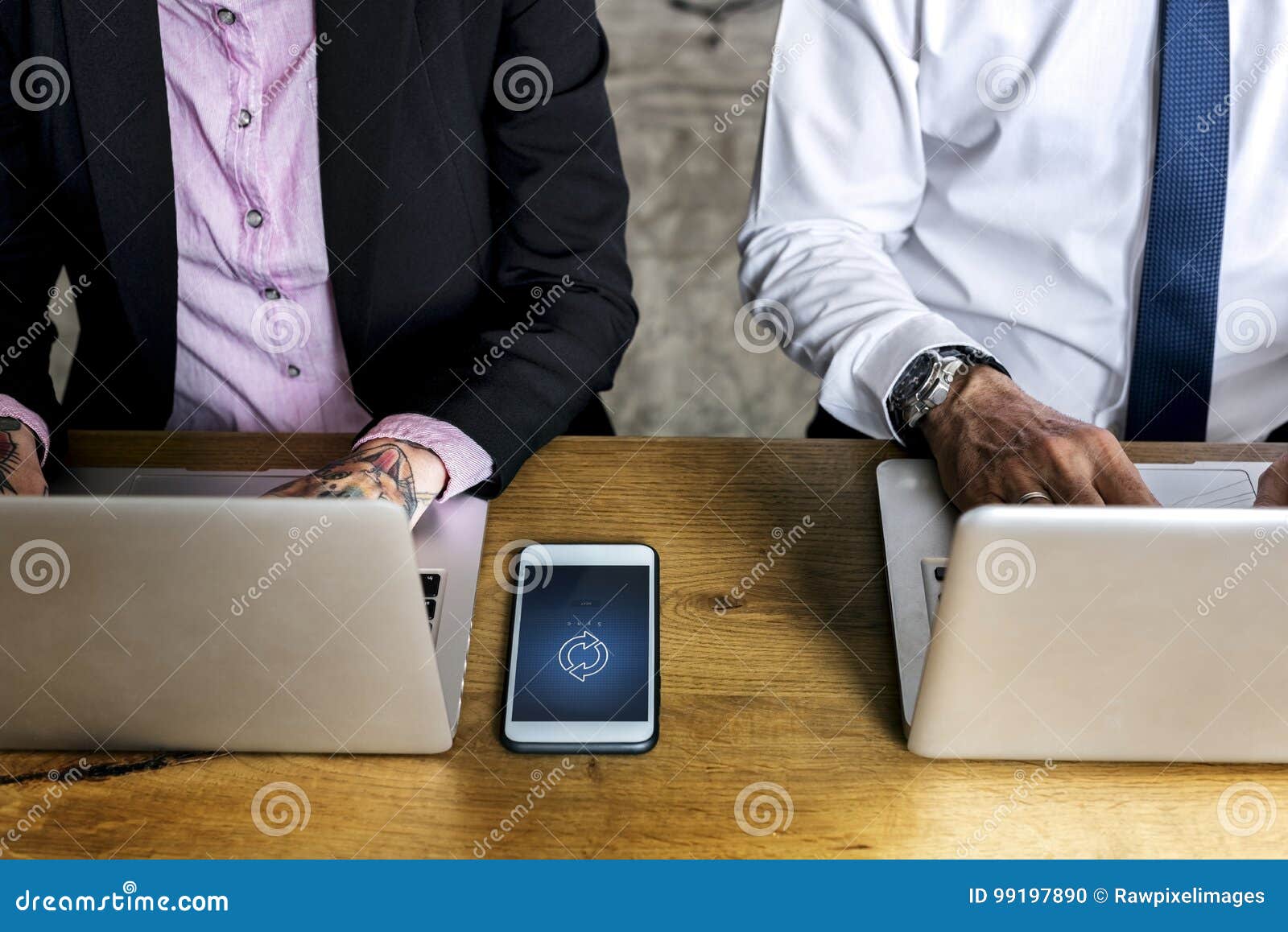 Hands Holding a Smartphone with Sync Symbol on Screen Stock Photo ...