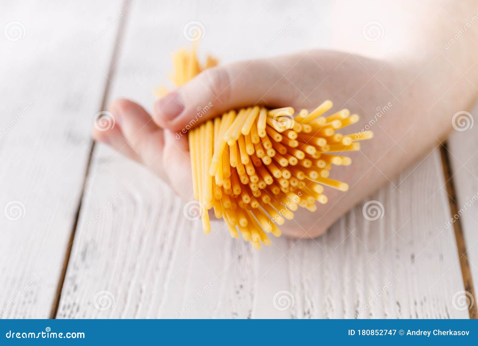 Hands Holding Spaghetti in the Kitchen Stock Image - Image of macaroni ...