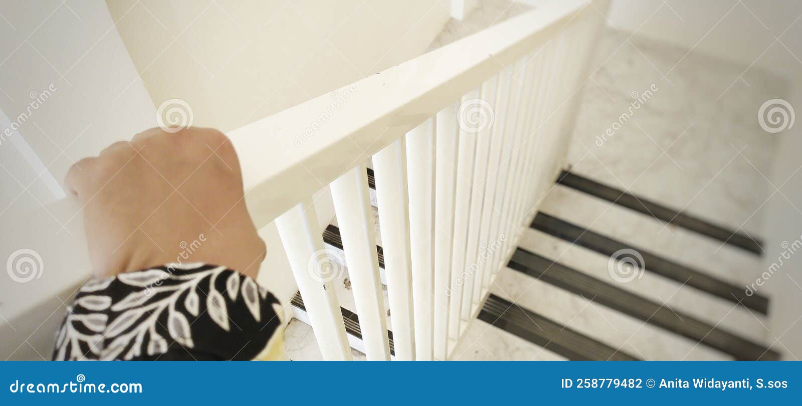 Hands Holding the Stairs of the House Downwards Stock Photo - Image of ...