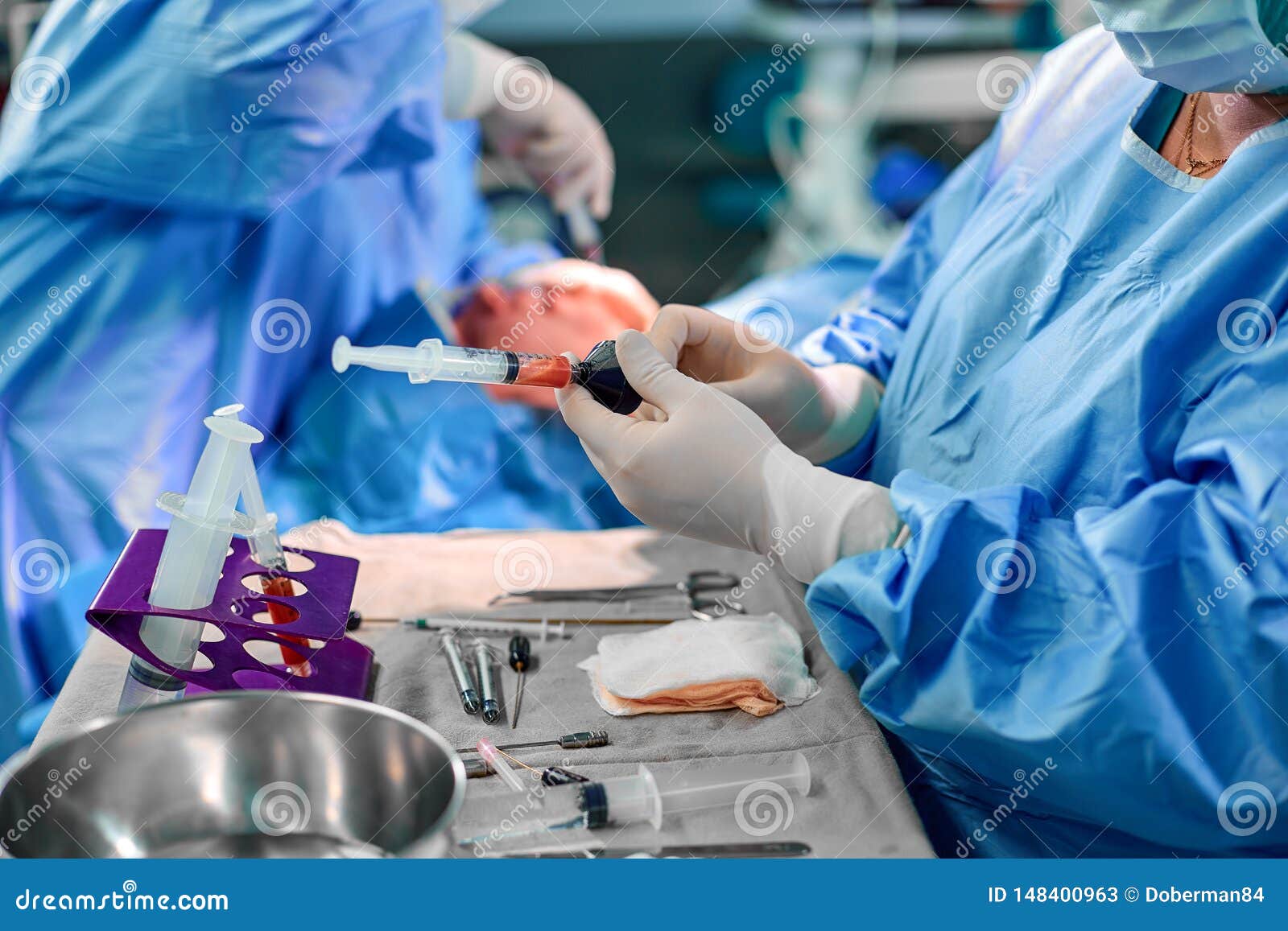 Hands Holding Syringe and Transfer Fat with Nano Fat Transfer Tool in ...