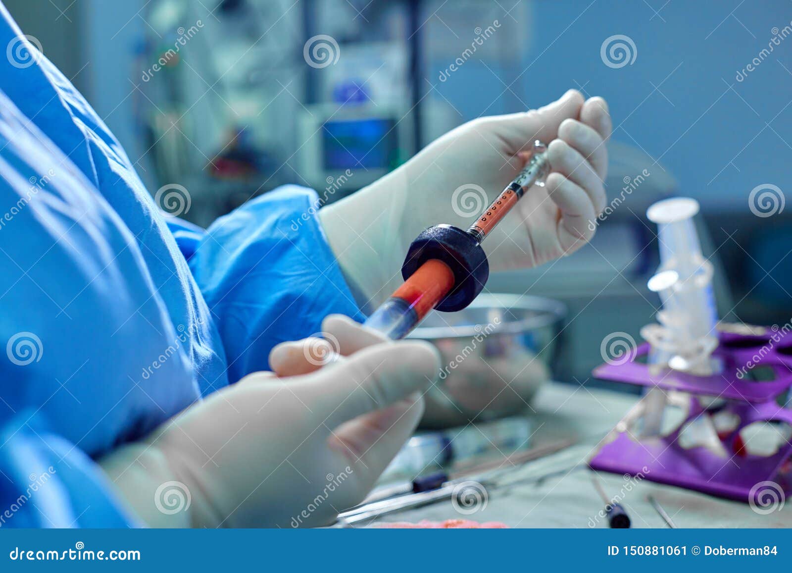 Hands Holding Syringe and Transfer Fat with Nano Fat Transfer Tool in ...