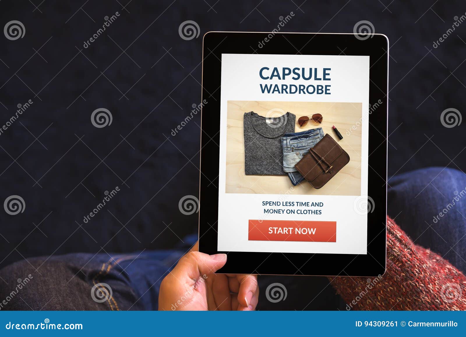 Hands Holding Tablet with Capsule Wardrobe Concept on Screen Stock ...