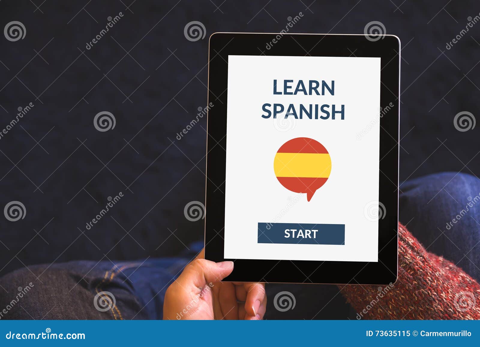 Hands Holding Tablet with Online Learn Spanish Concept on Screen Stock ...
