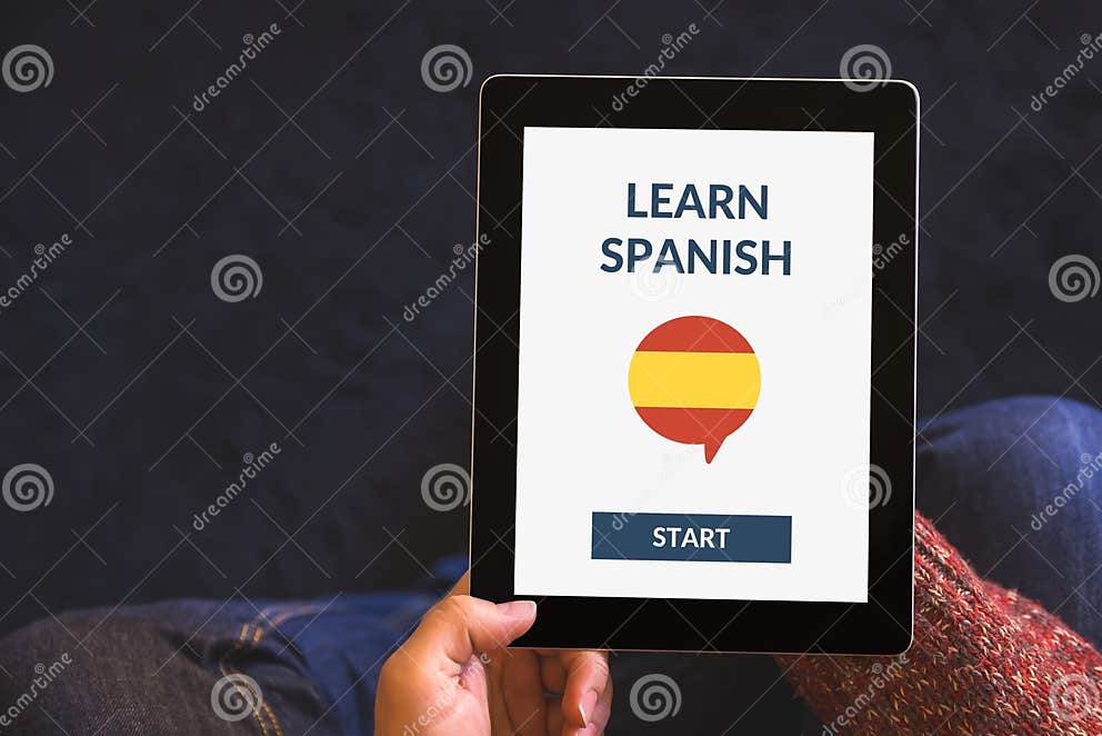 Hands Holding Tablet with Online Learn Spanish Concept on Screen Stock ...
