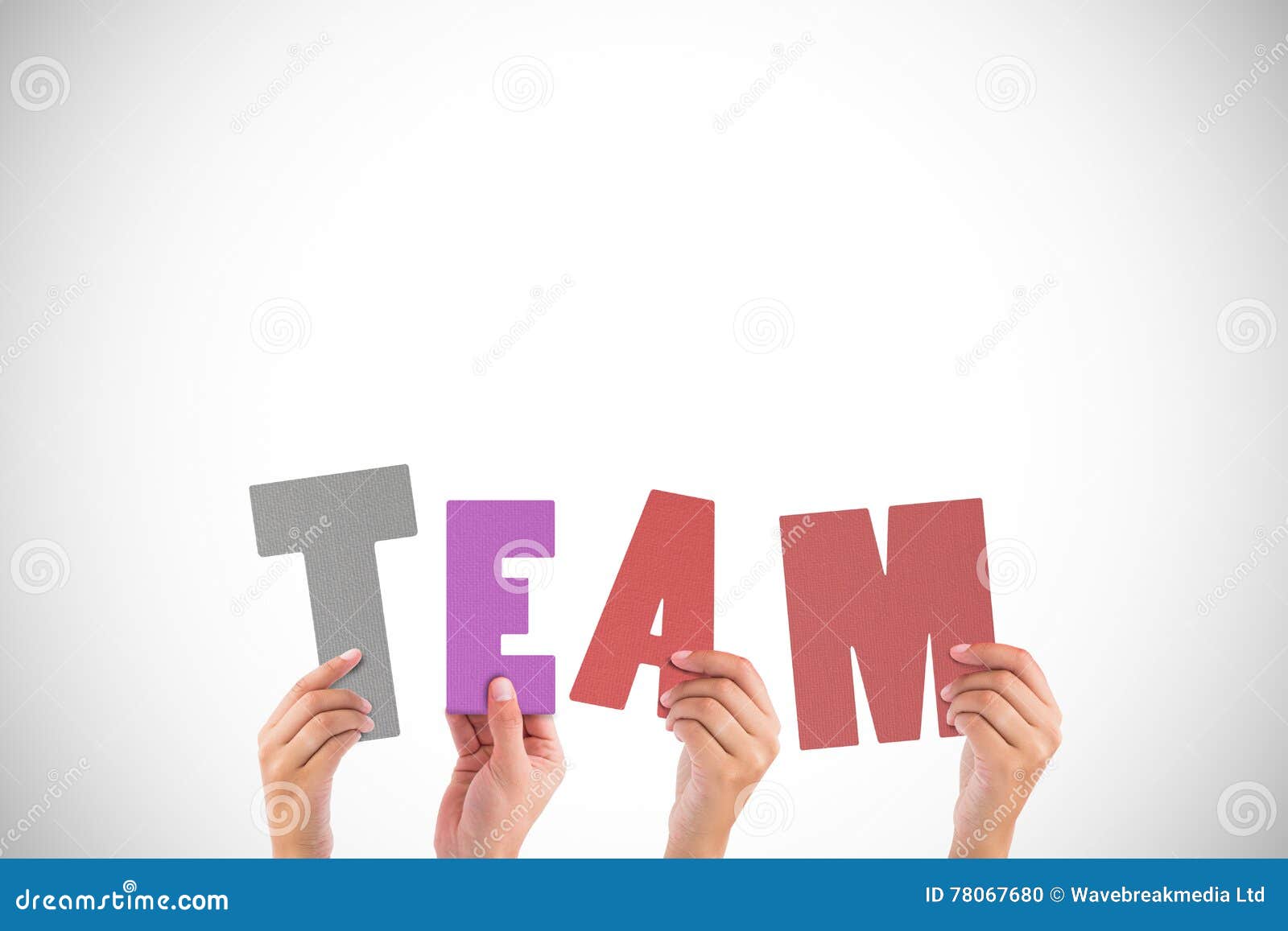 Hands holding team letters stock photo. Image of spelling - 78067680