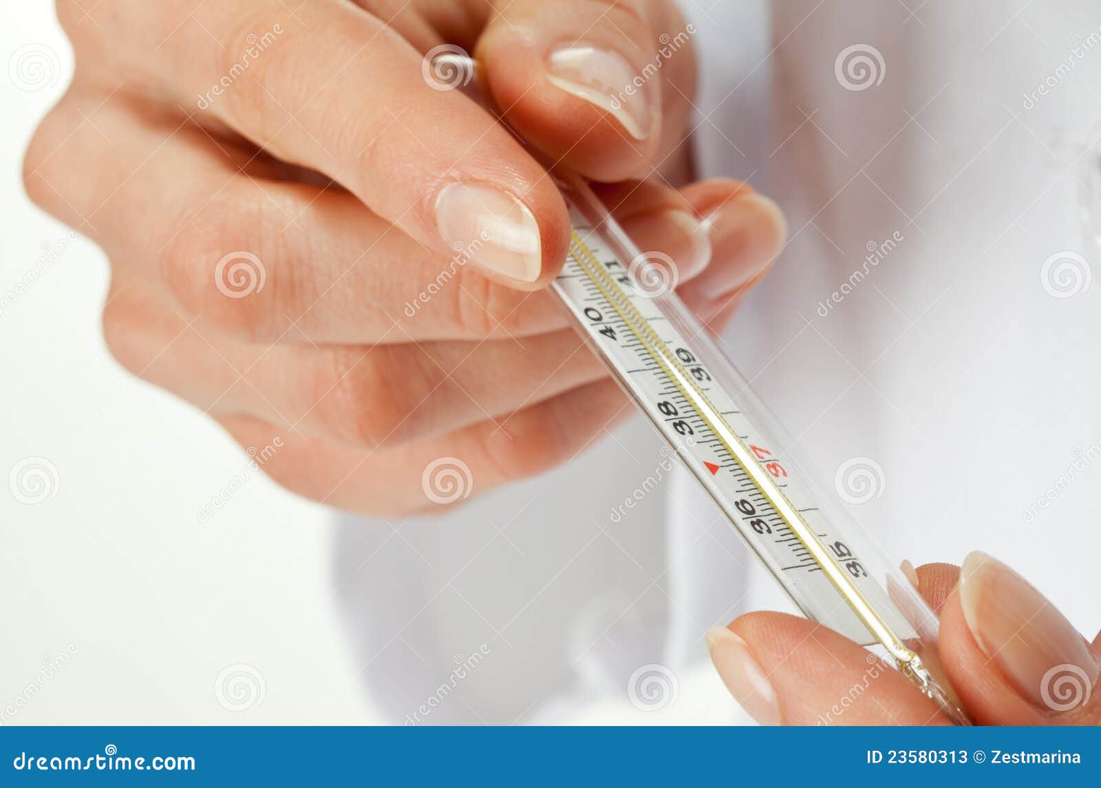 Hands holding thermometer stock image. Image of closeup - 23580313
