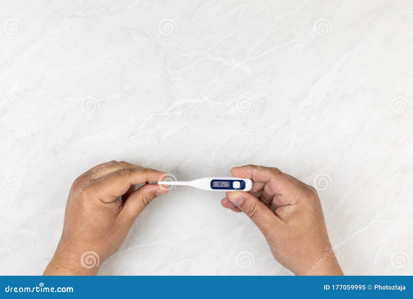 Hands Holding Thermometer with High Temperature on Digital Display ...