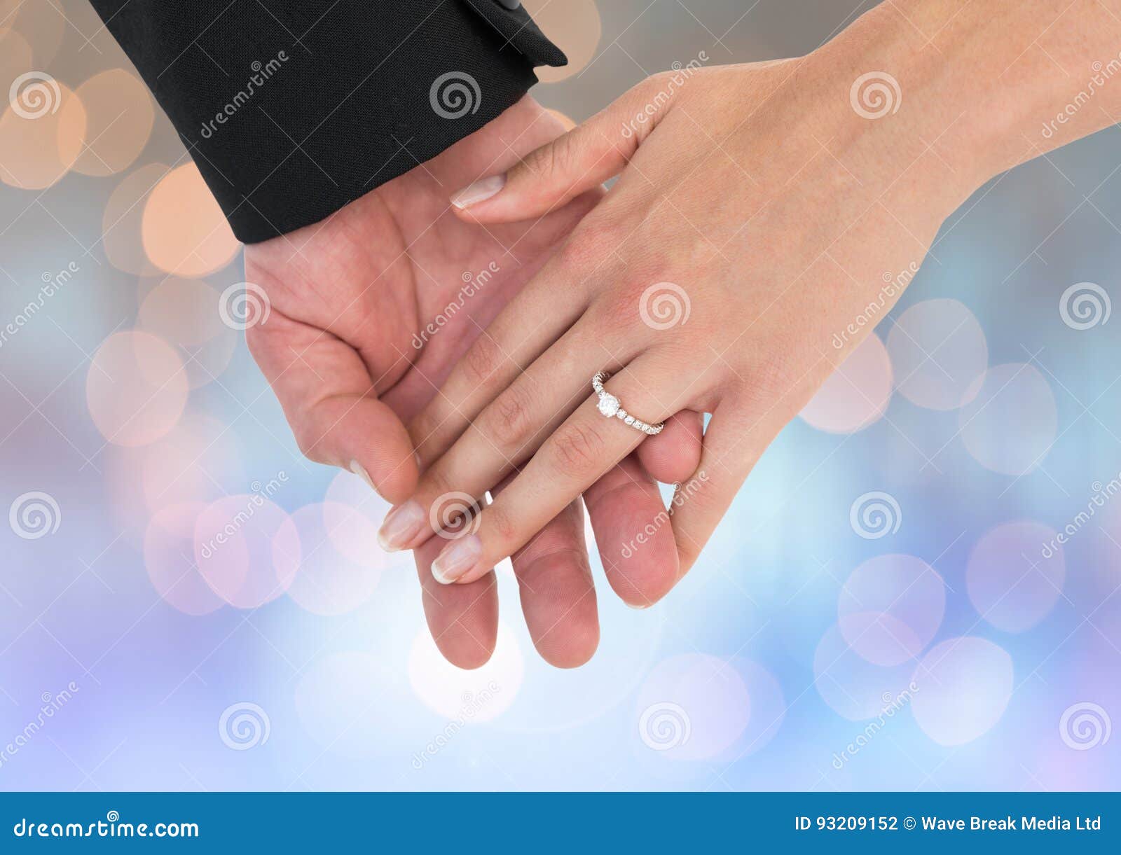 Hands Holding Together Wedding Engagement Ring with Sparkling Light ...