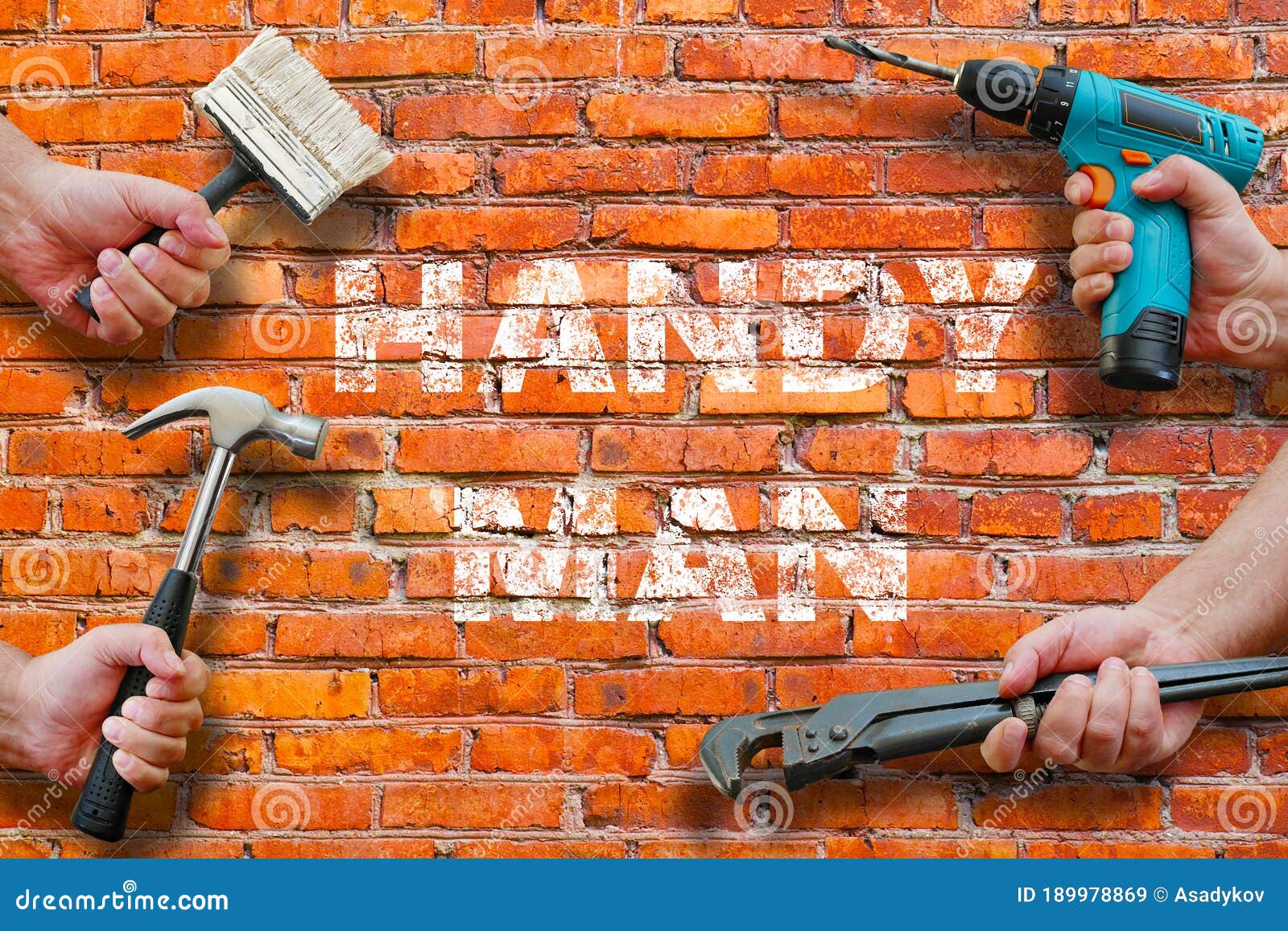 Hands Holding Tools on Brickwall Background with Handyman Text on it ...