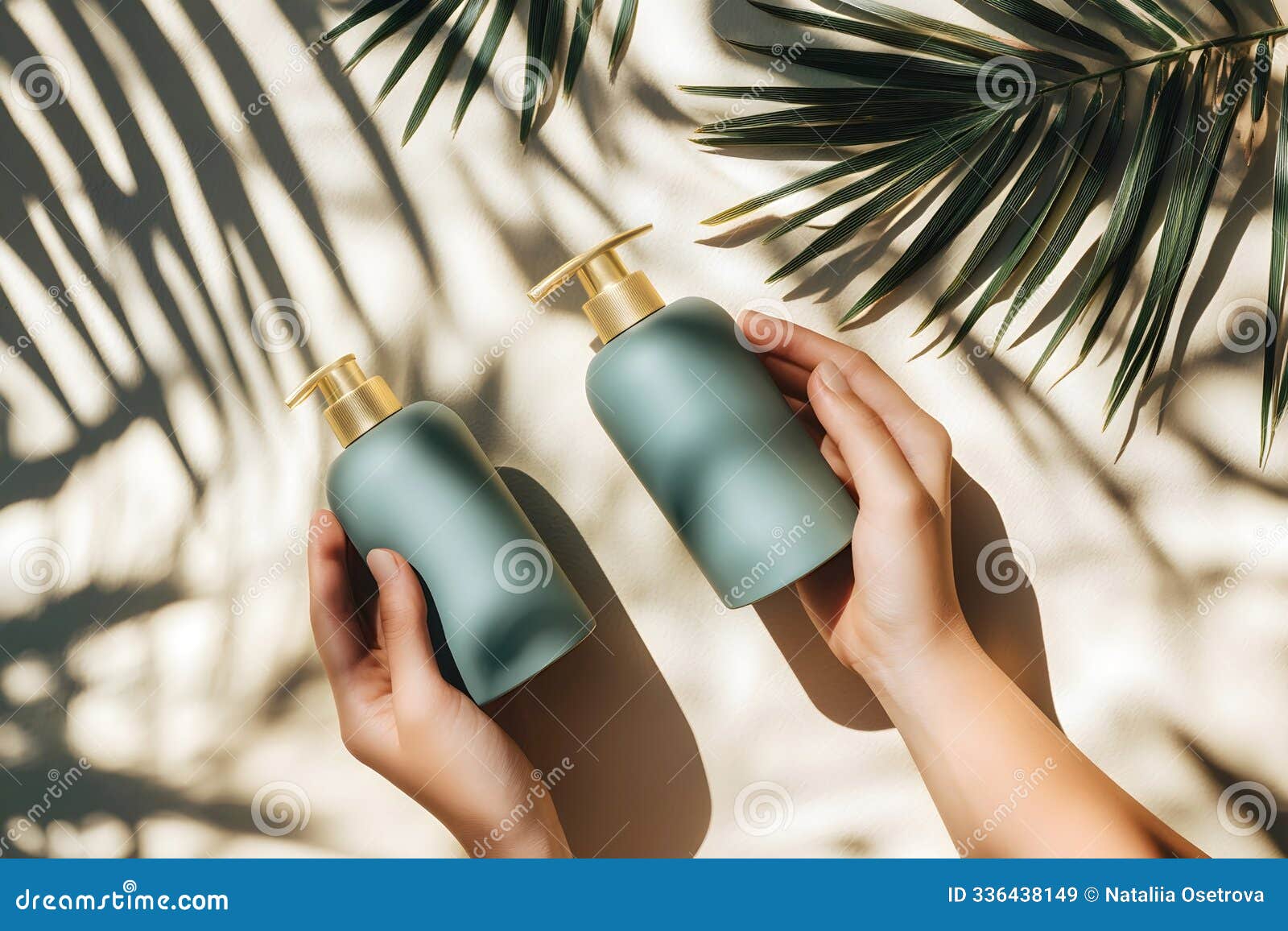 Hands Holding Two Matte Pump Bottles with Palm Leaves Casting Shadows ...