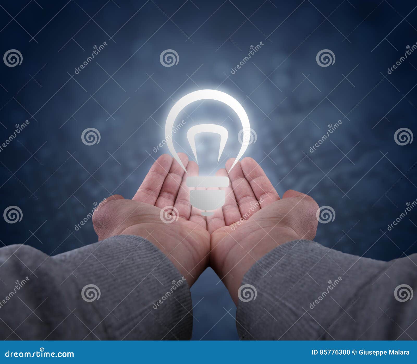 Hands Holding Up a Light Bulb Stock Photo - Image of hands, economic ...