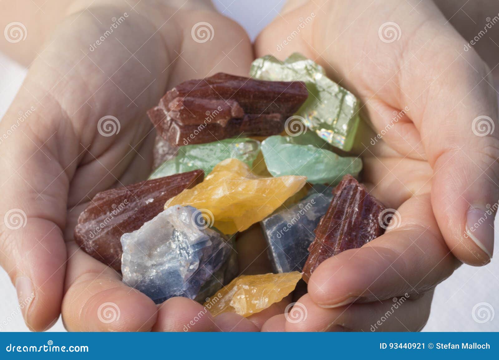 Hands Holding Various Pieces of Calcite Stock Image - Image of ...