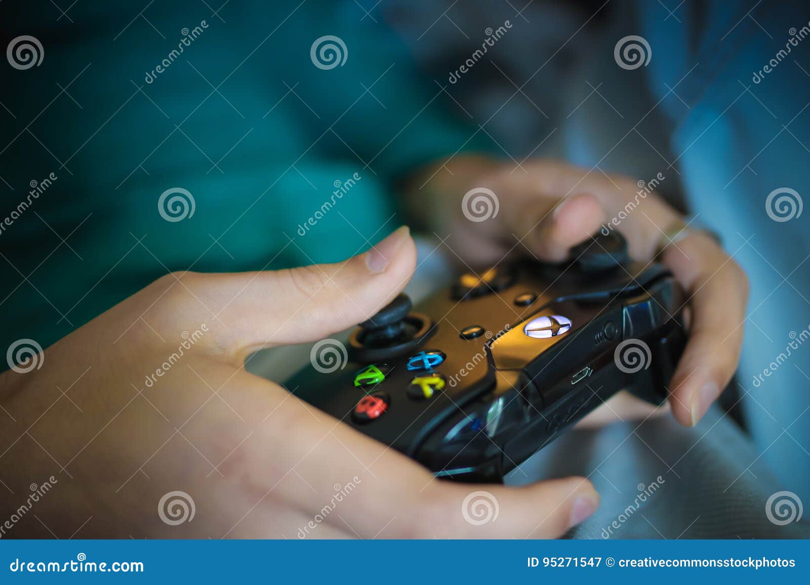 Hands Holding Video Game Controller Picture. Image: 95271547