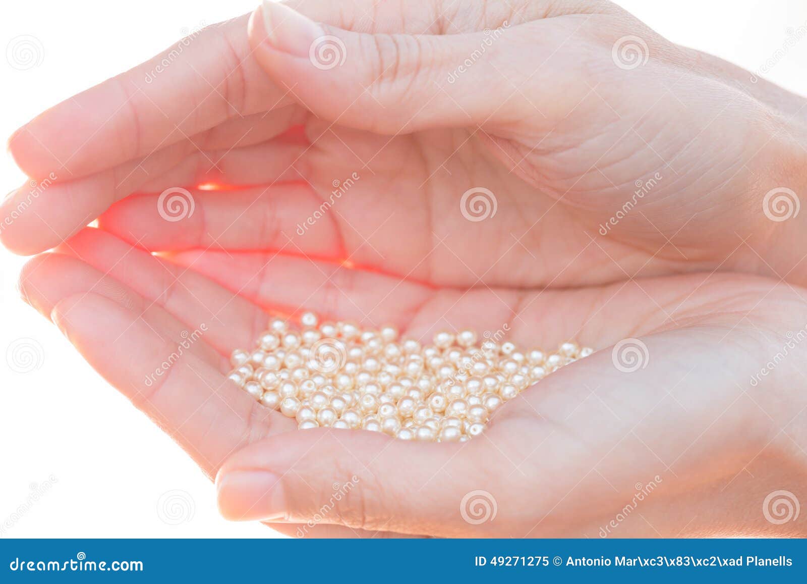 Hands holding white pearl stock image. Image of hand - 49271275
