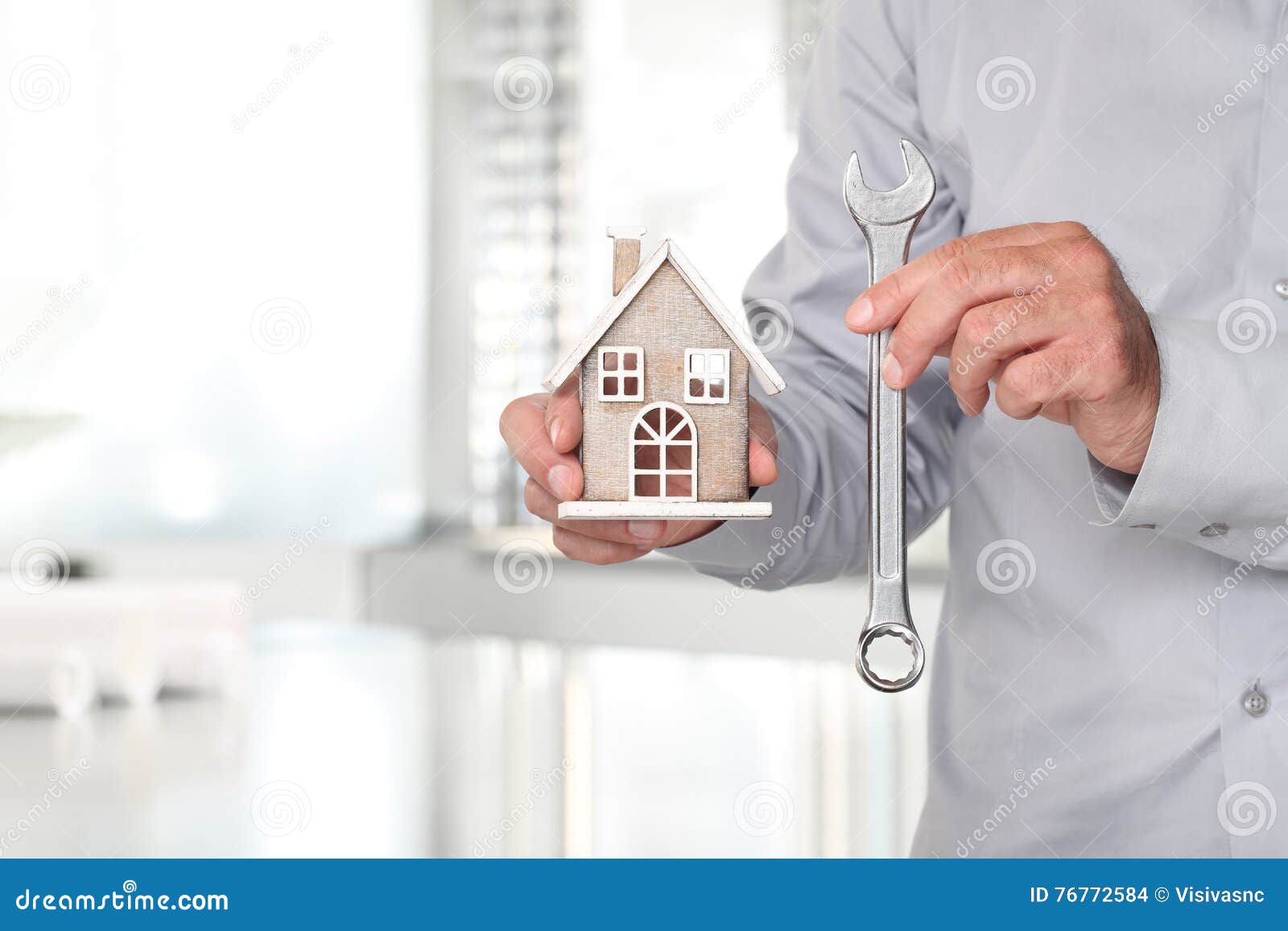 Hands with House and Spanner, Install and Construction Concept Stock ...