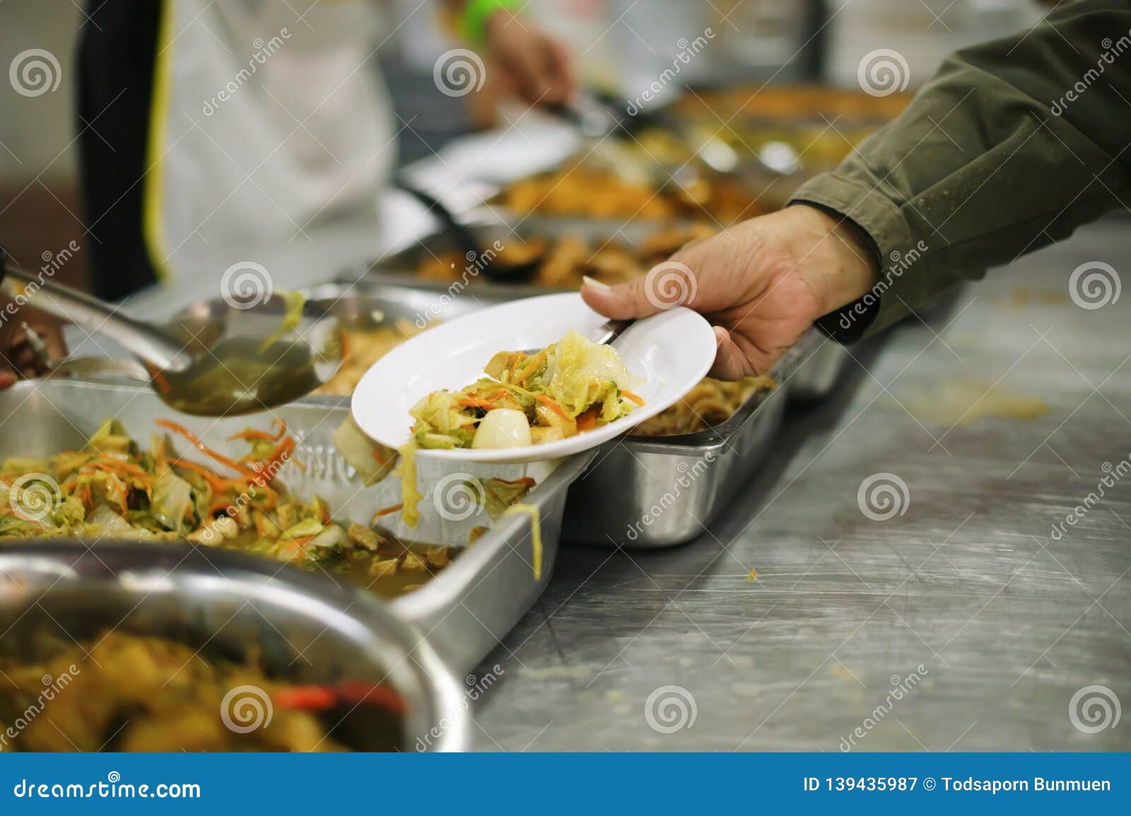 The Hands of the Hungry are Asking for Food from the Donor Stock Image ...