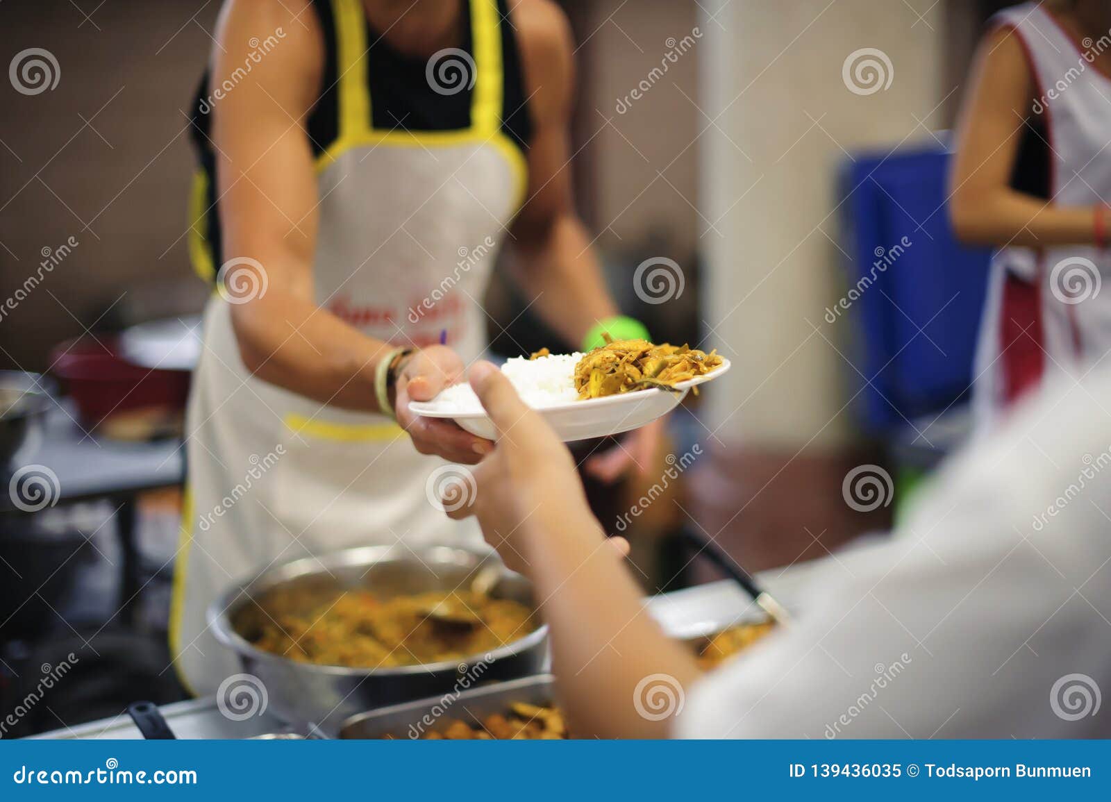 The Hands of the Hungry are Asking for Food from the Donor Stock Image ...
