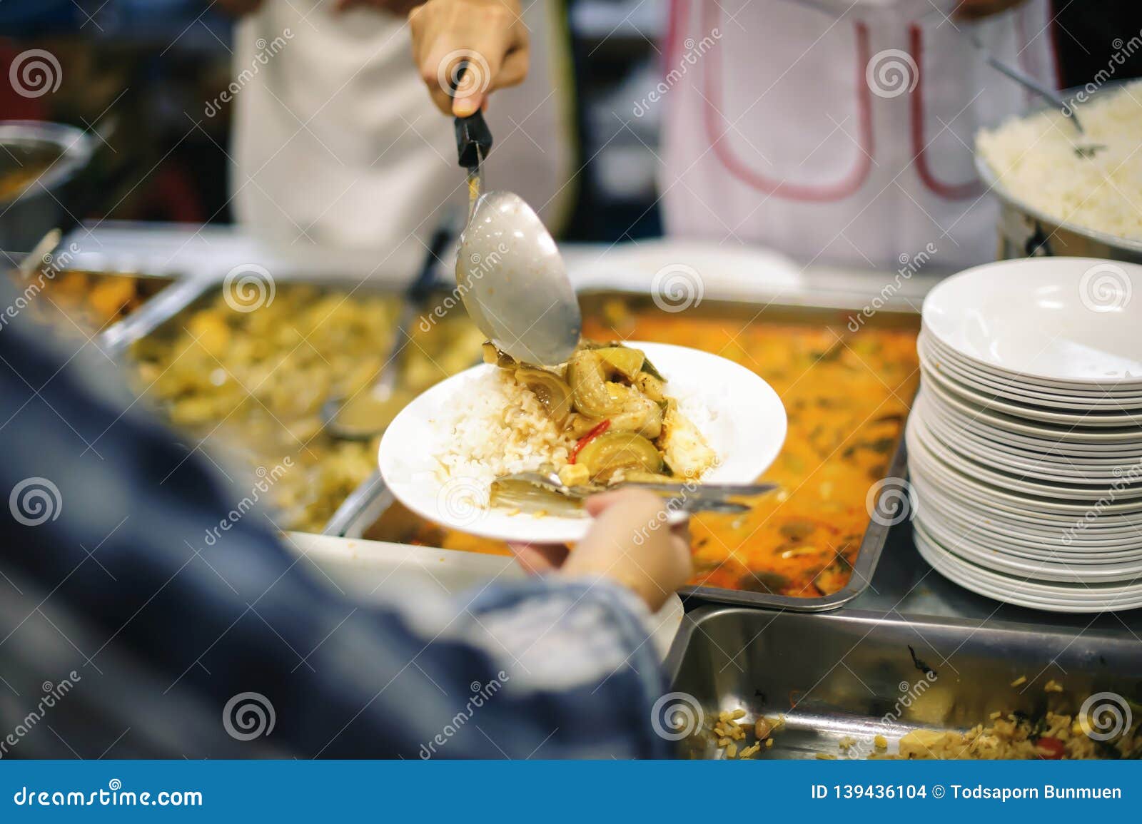 The Hands of the Hungry are Asking for Food from the Donor Stock Photo ...