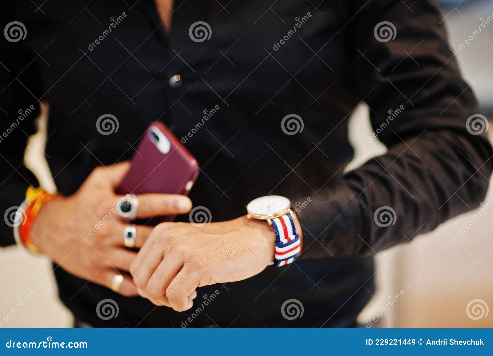 Hands of Indian Man Posed with Mobile Phone and Looking at His Watches ...