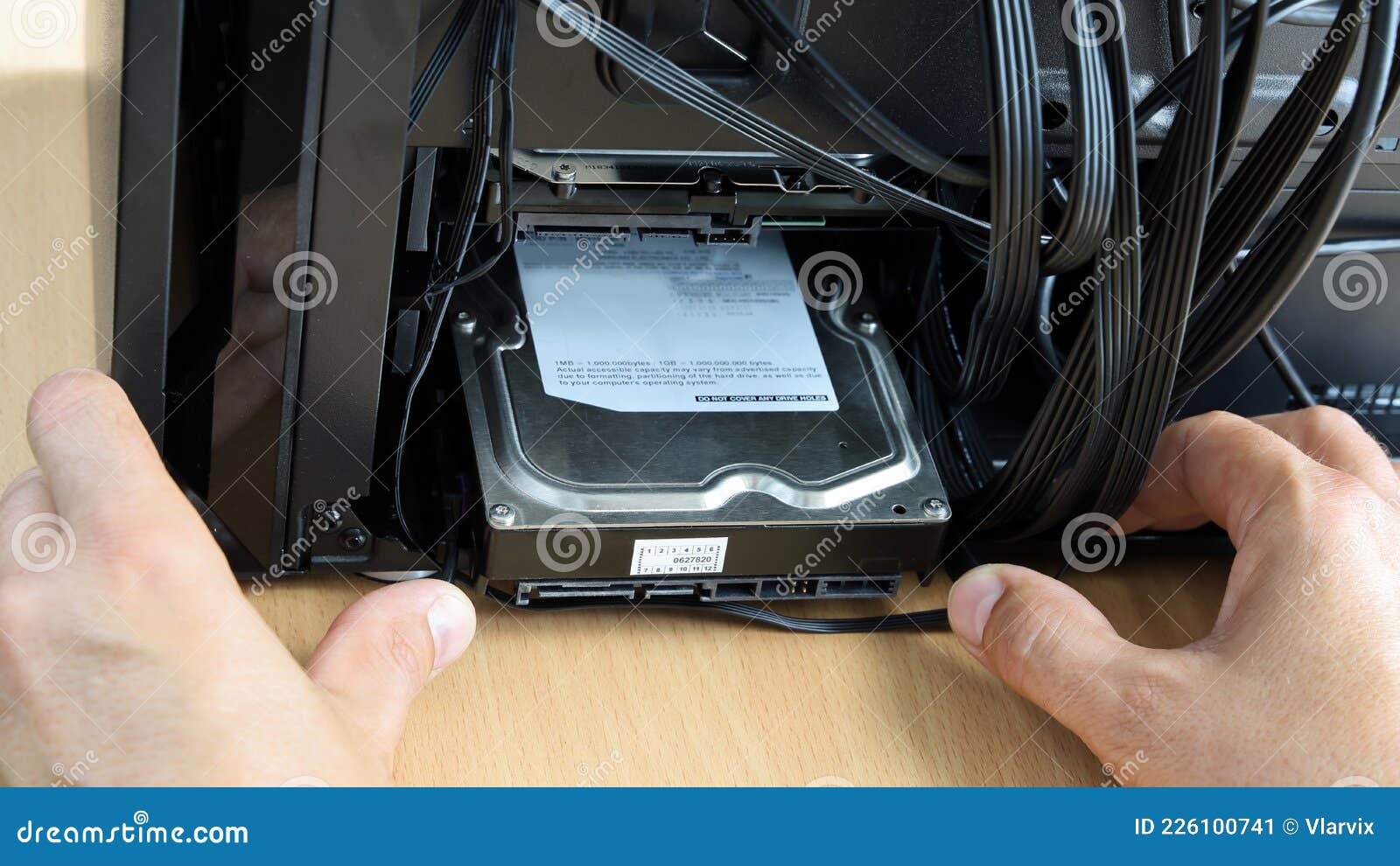 Hands Inserts Hard Disk Memory into System Unit of Computer Stock Image ...