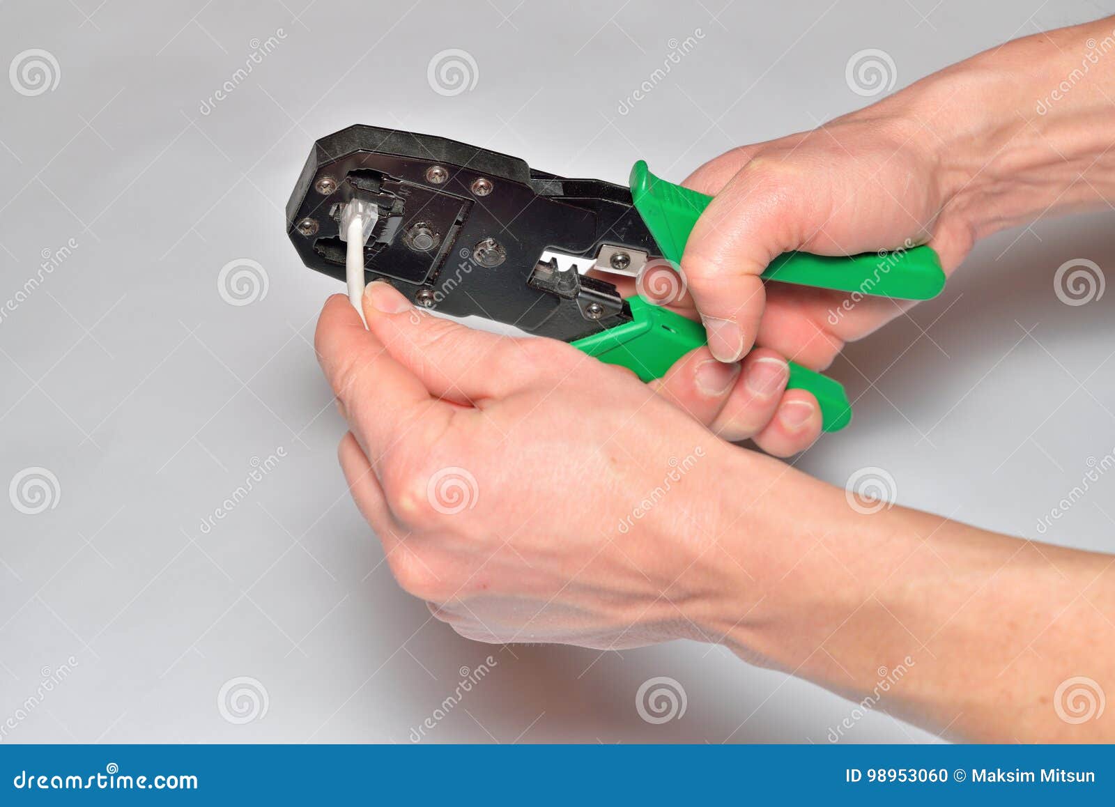 Hands of the Installer, Computer Network, Fix the Connector on T Stock ... Hands of the Installer, Computer Network, Fix the Connector on T Stock ...