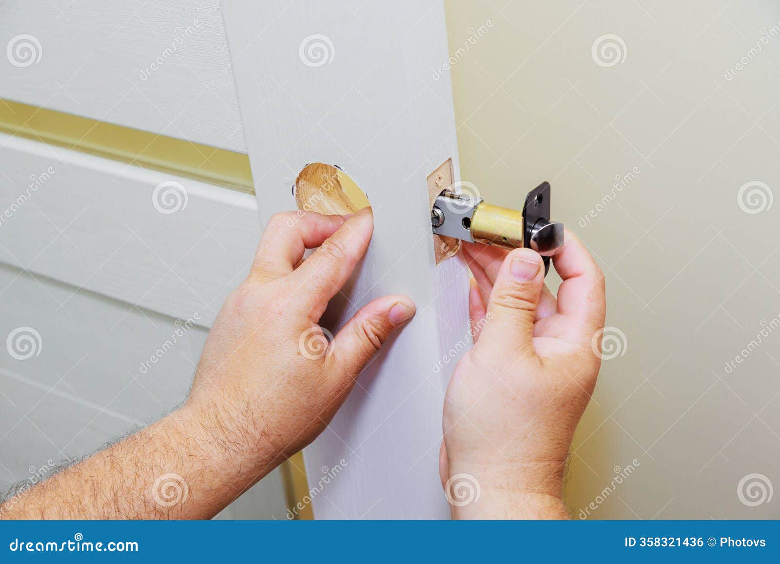 Door Lock Installation Process with Hands Fixing a Lock Cylinder at ...