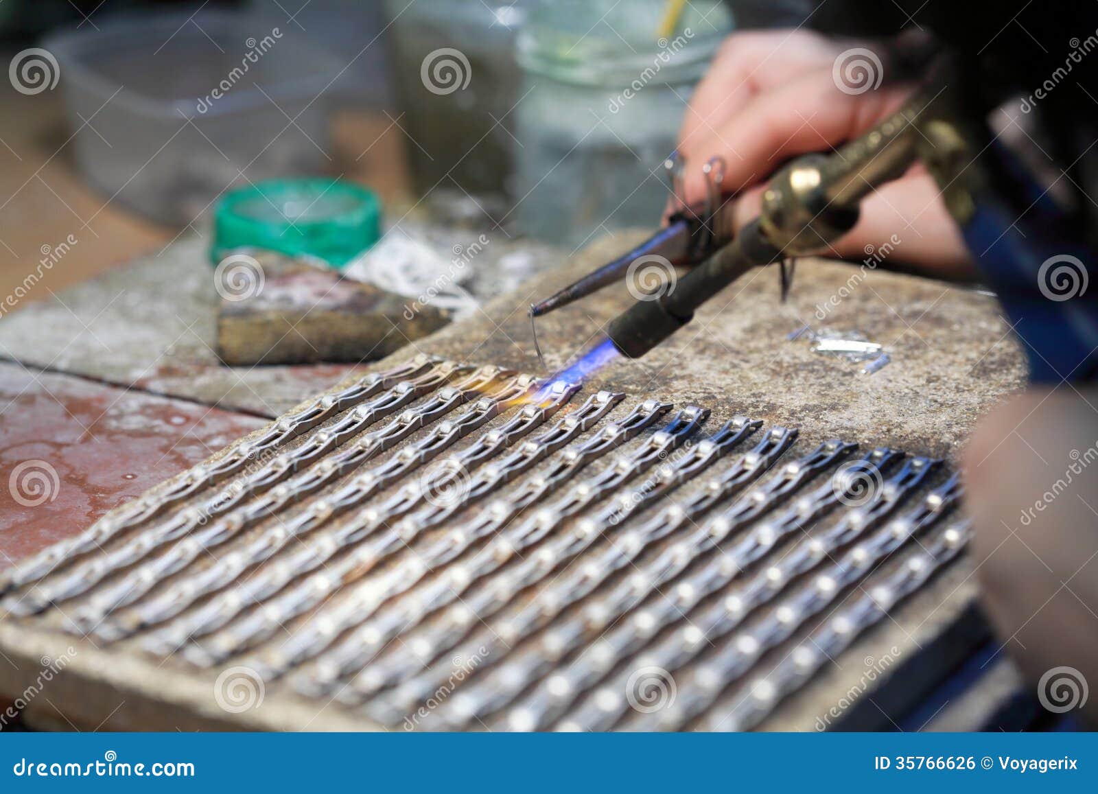 Hands of Jeweller at Work Silver Soldering Stock Photo - Image of ...