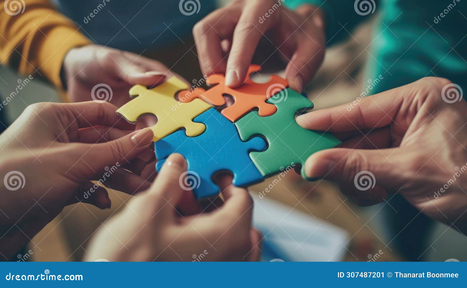 Hands Join Puzzle Pieces in Office, Symbolizing Teamwork & Partnership ...