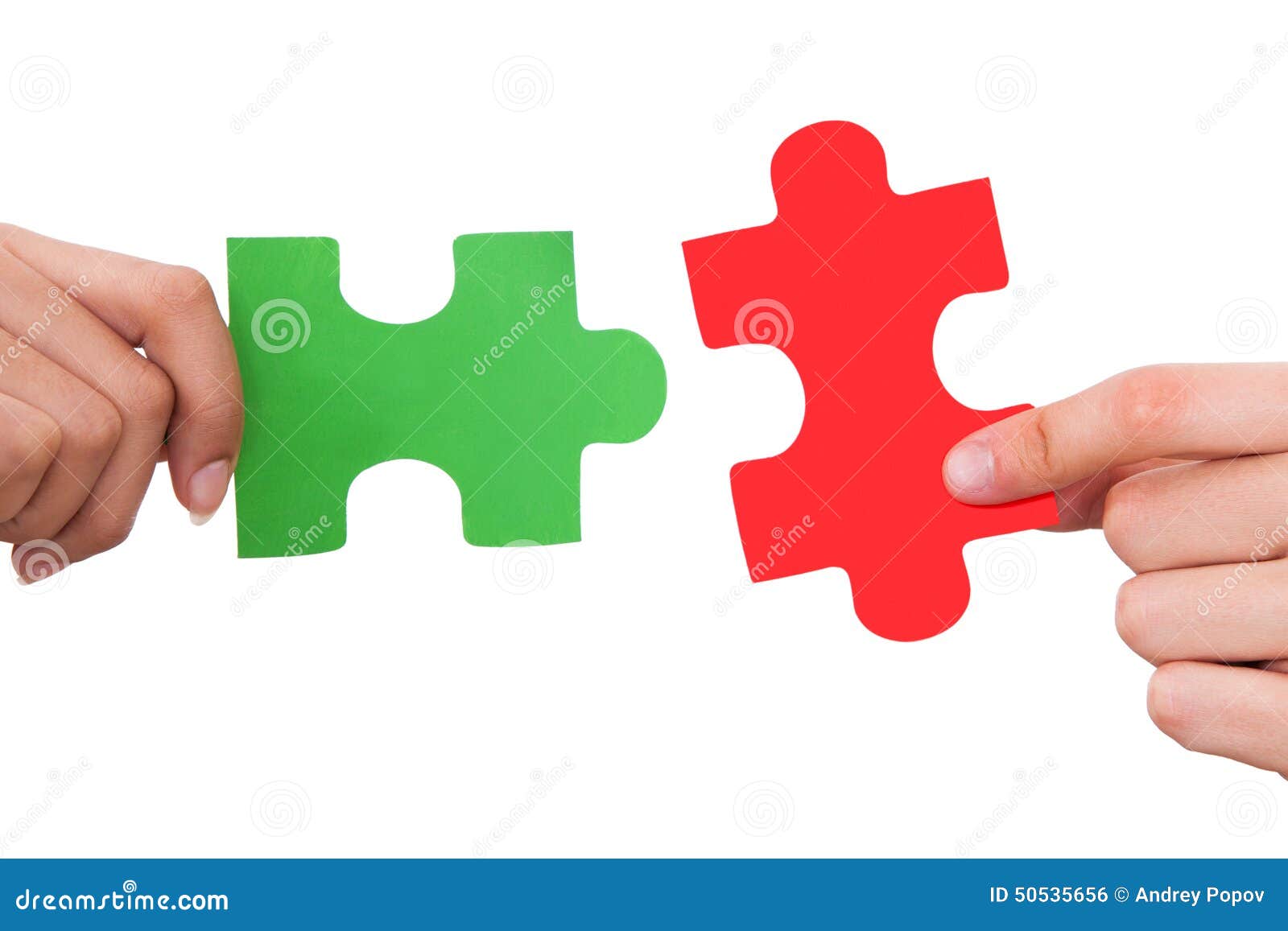 Hands Joining Jigsaw Puzzle Pieces Stock Photo - Image of ...