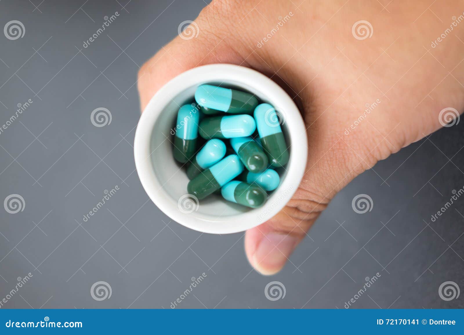 Hands Keep Heap of Blue Green Round Capsule Stock Image - Image of ...