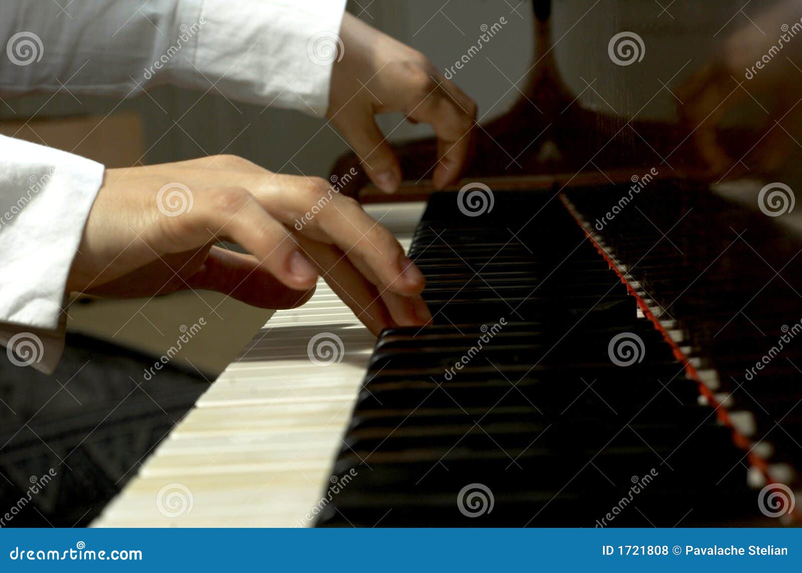 Hands at the Keys of a Piano Stock Photo - Image of hand, grand: 1721808