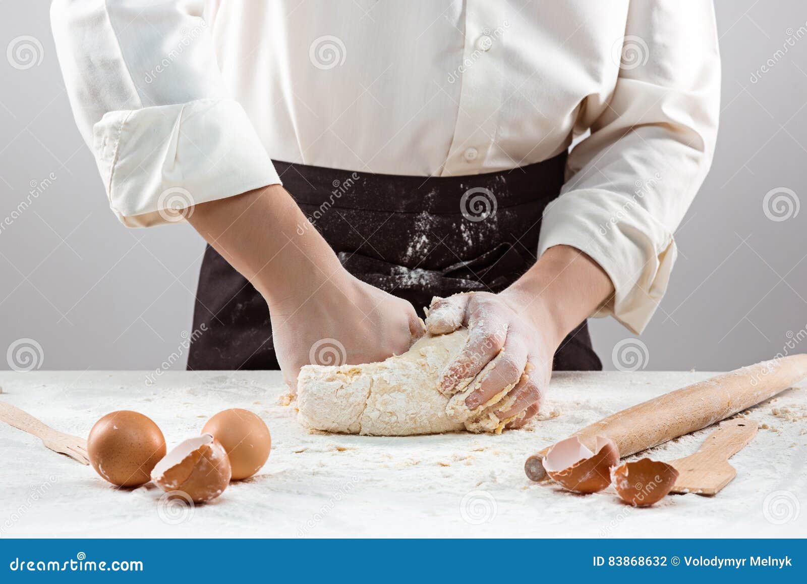 Hands kneading a dough stock photo. Image of mixing, loaf - 83868632