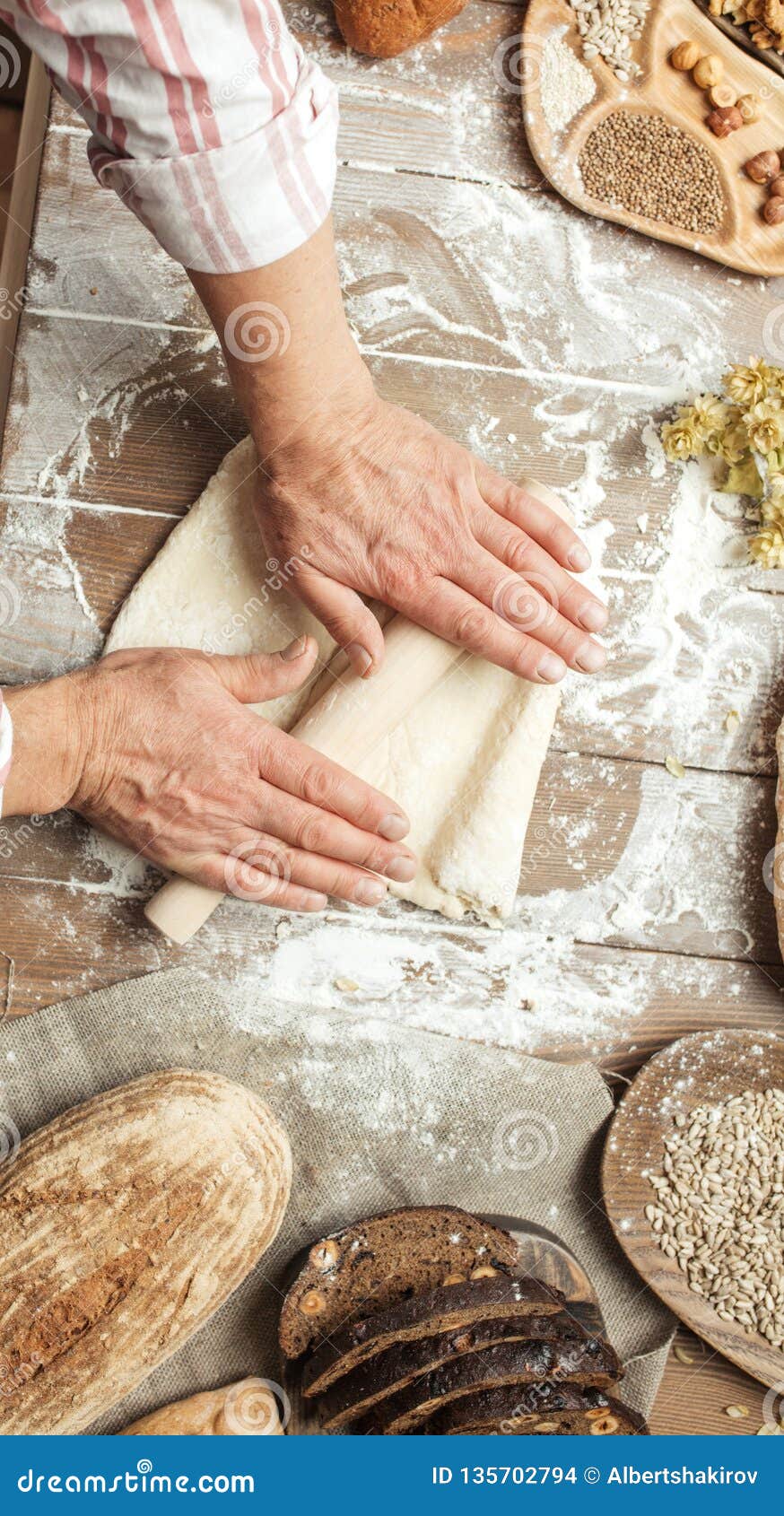 Man Rolling Out Dough on Kitchen Table, Close Up Stock Photo - Image of ...