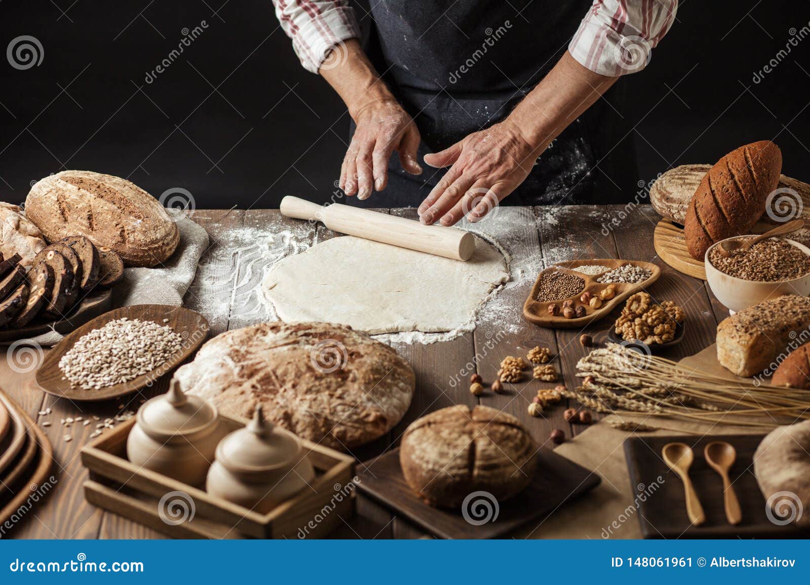 Man Rolling Out Dough on Kitchen Table, Close Up Stock Image - Image of ...
