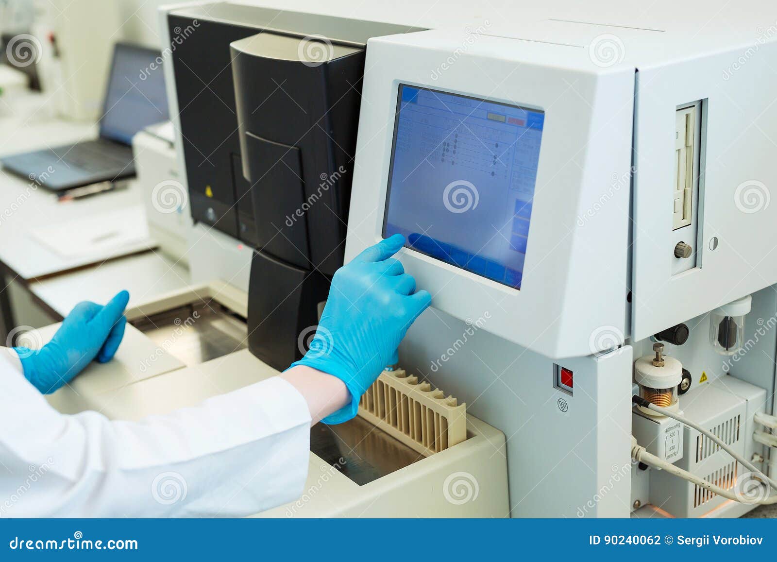 Hands of Laboratory Assistant Loading Sample Tubes for Coagulation Test ...